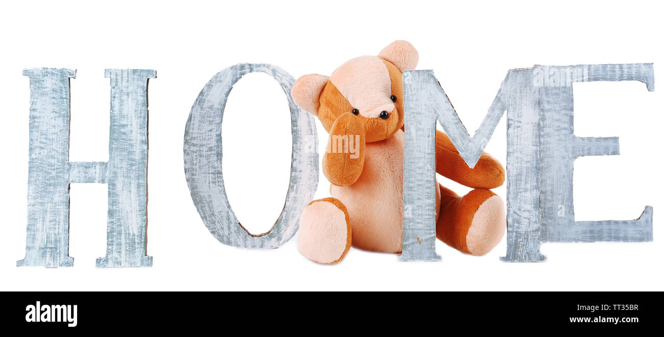Decorative letters forming word HOME with teddy bear isolated on white ...