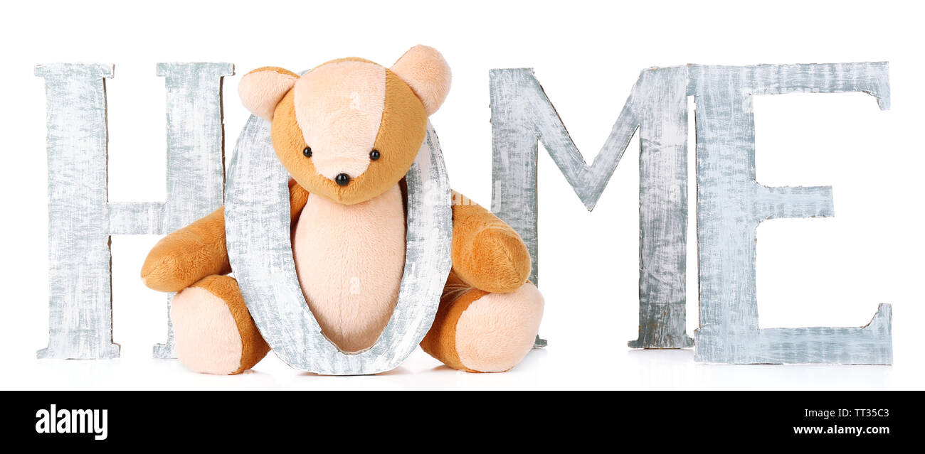 Decorative letters forming word HOME with teddy bear isolated on white ...