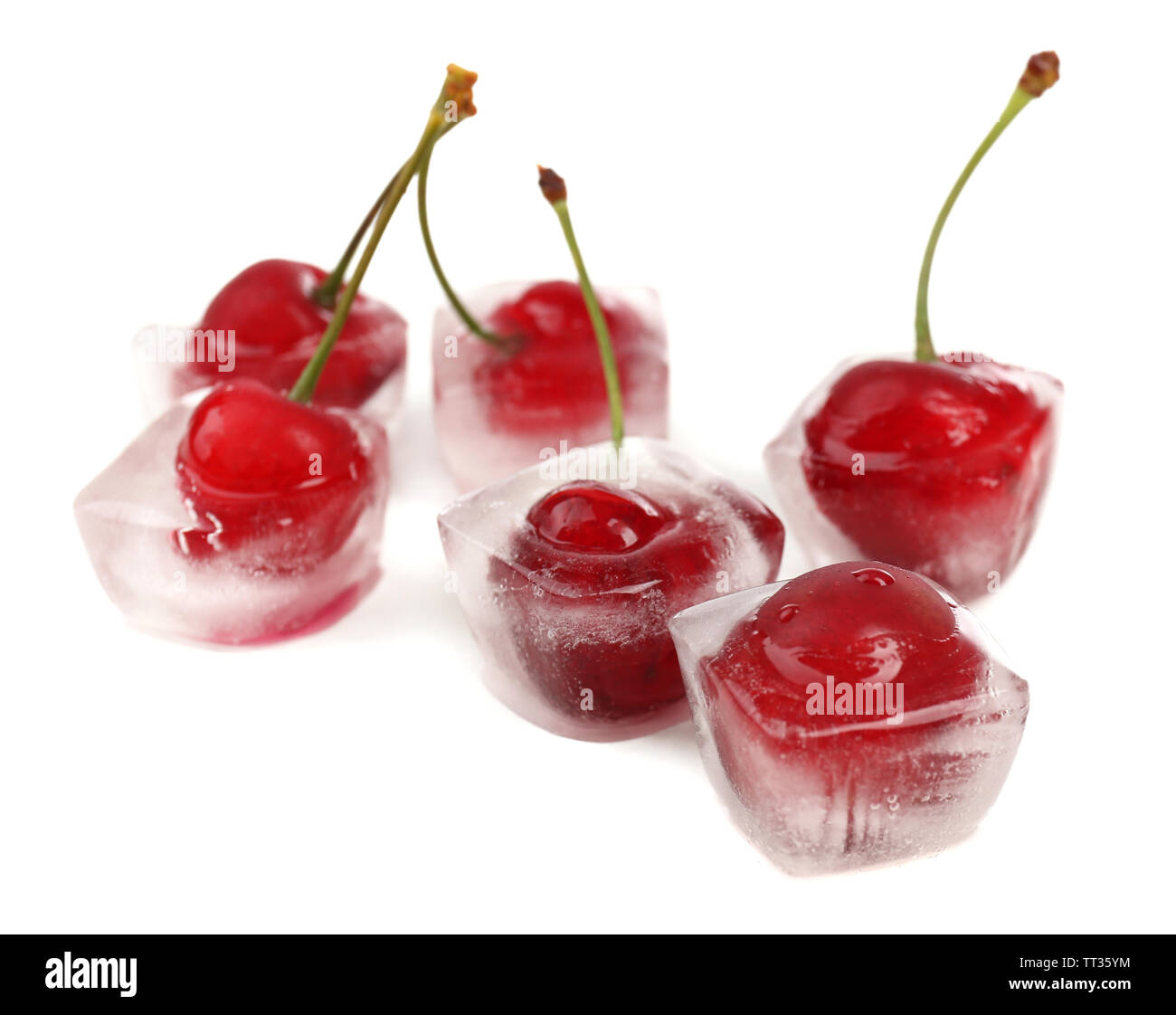 Cherry in ice cube isolated on white Stock Photo - Alamy