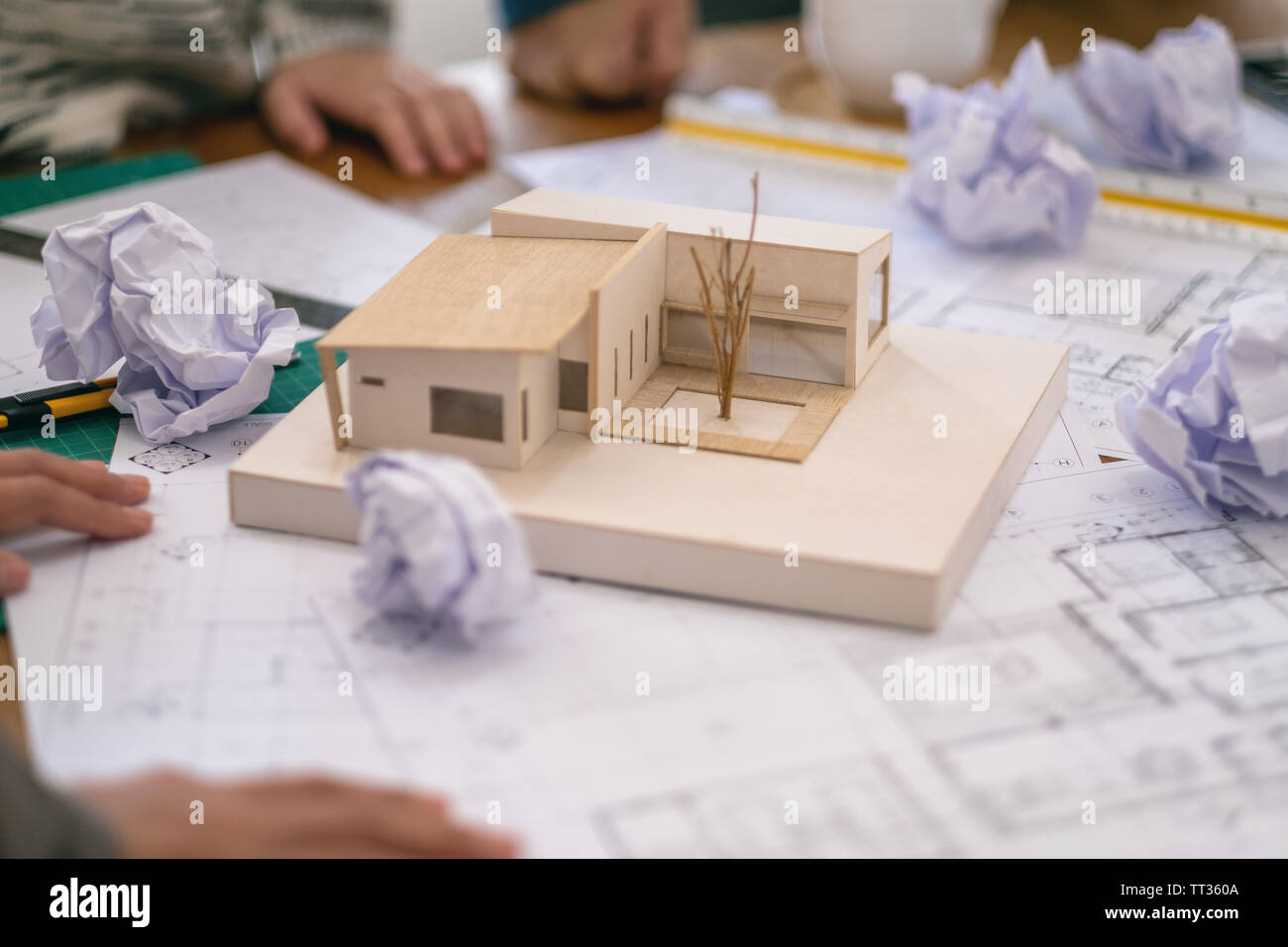 Group of an architect feel stressed after working on architecture model ...