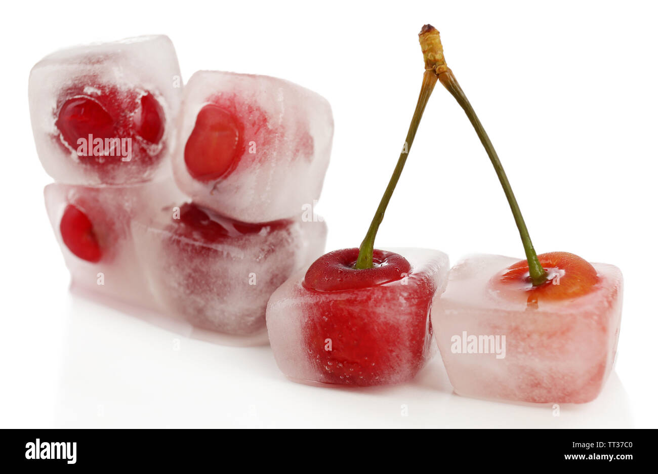 Cherry in ice cube isolated on white Stock Photo - Alamy
