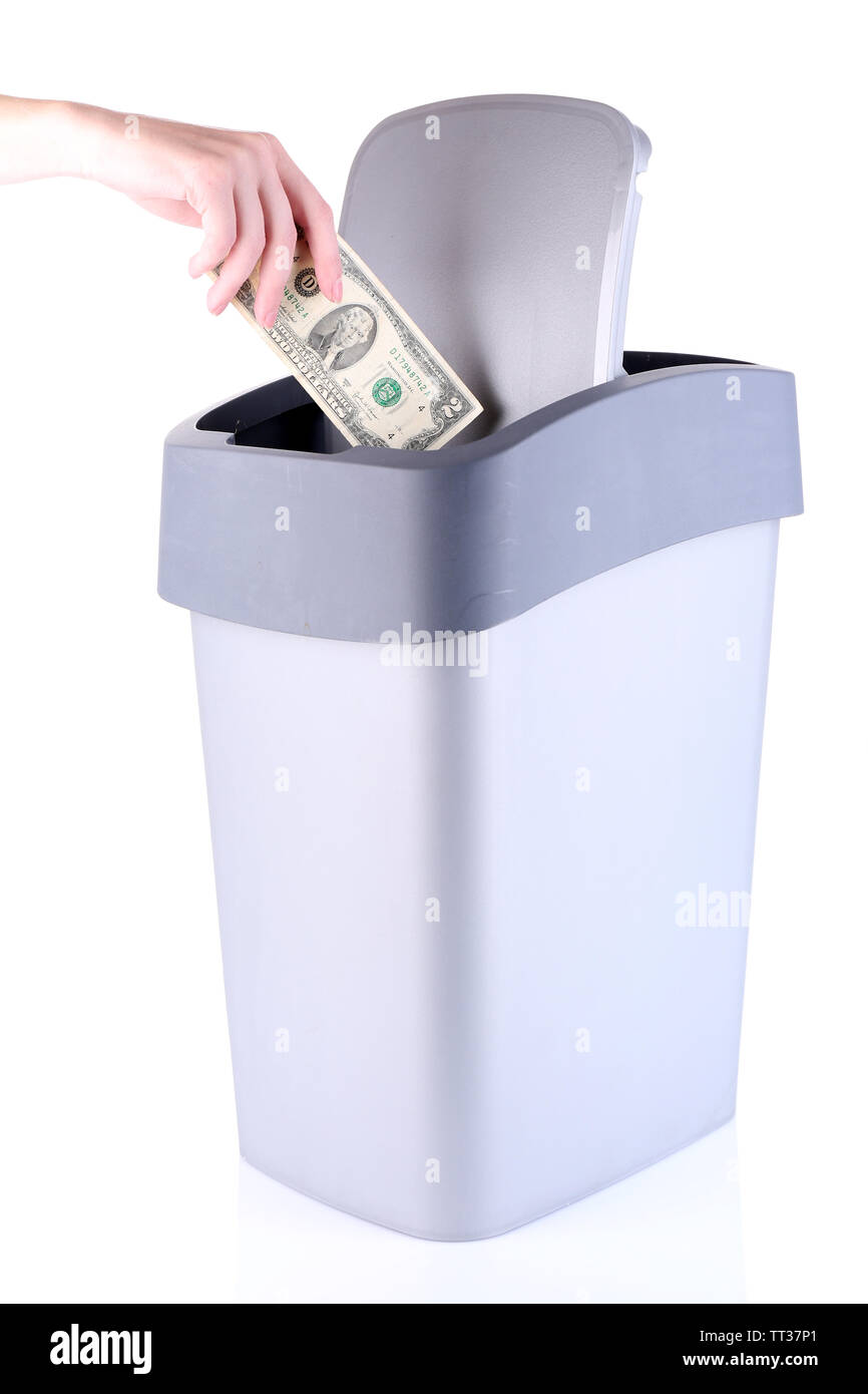 Throwing away your money, isolated on white Stock Photo - Alamy