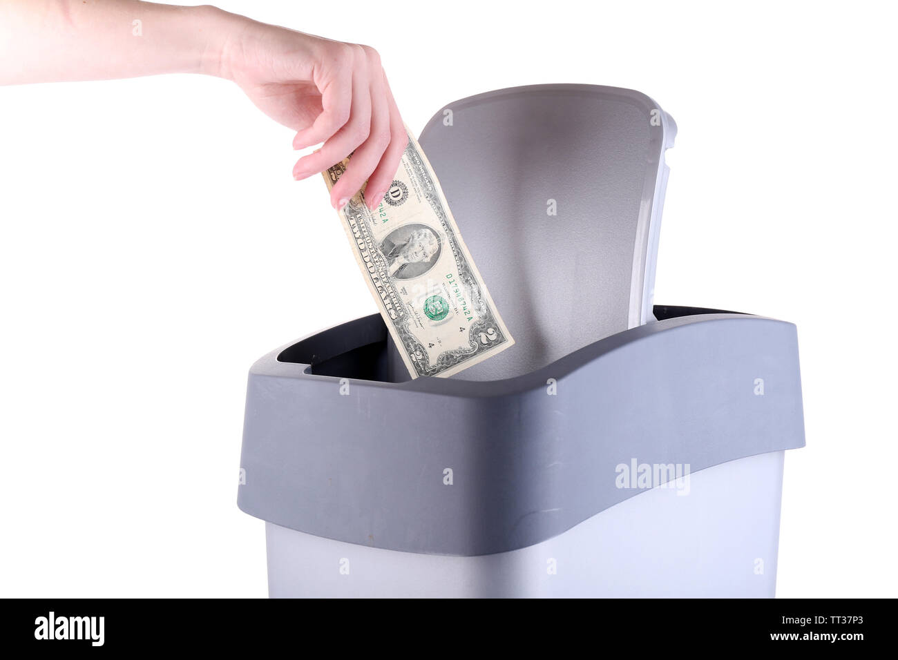 Throwing away your money, isolated on white Stock Photo - Alamy