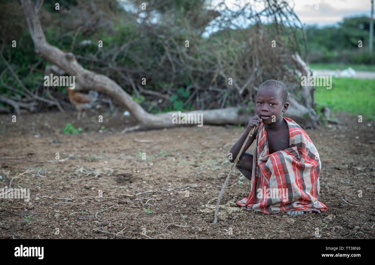 Same, Tanzania, 4th June, 2019: Maasai boy in his home boma (village ...