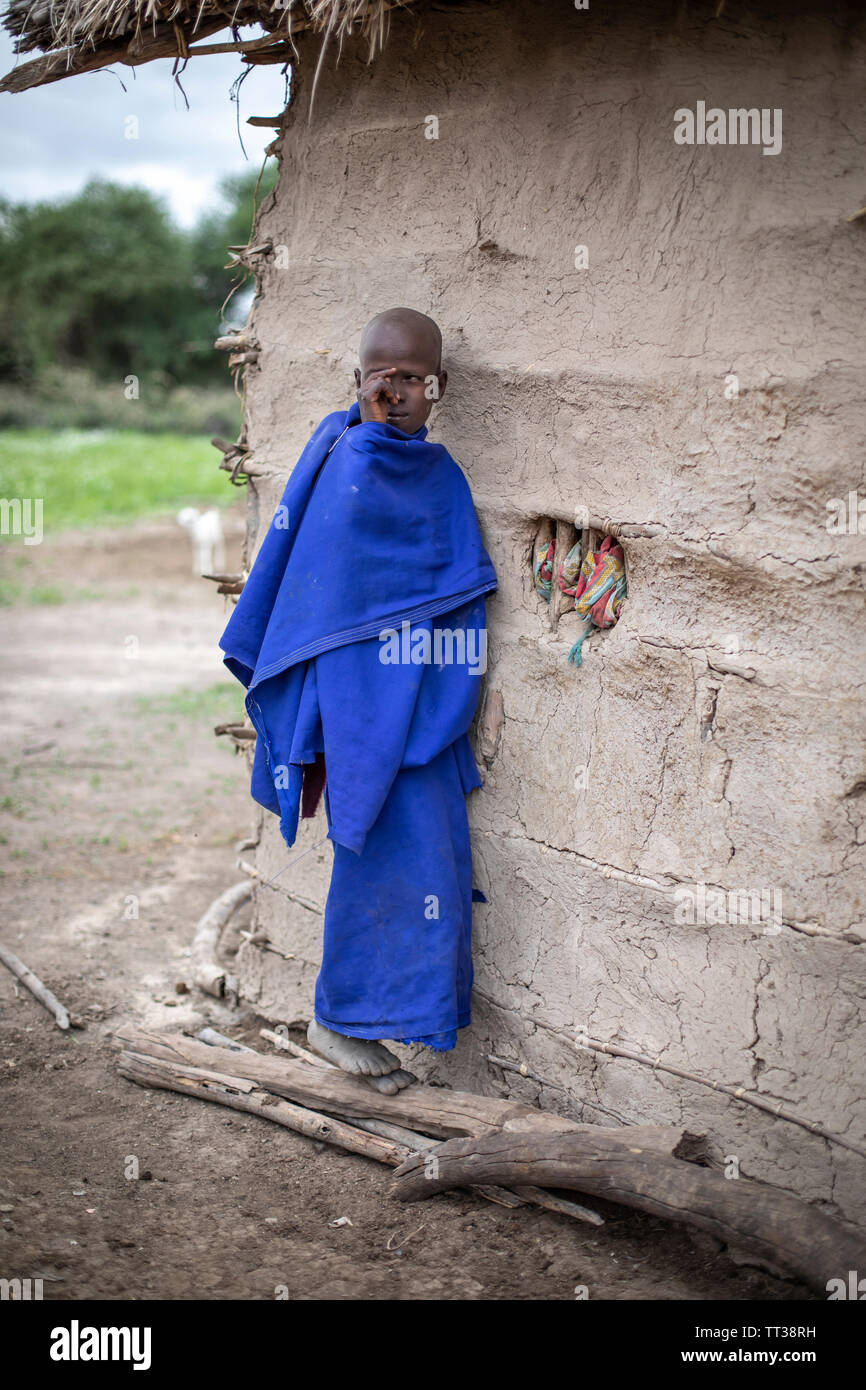 Same, Tanzania, 5th June, 2019: Maasai boy in front of his home Stock ...