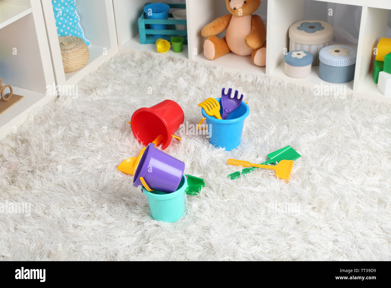 Colorful plastic toys in children room Stock Photo - Alamy