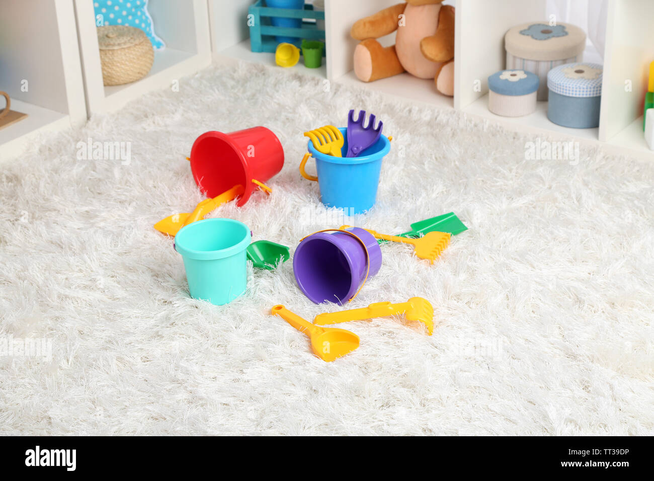 Colorful plastic toys in children room Stock Photo - Alamy