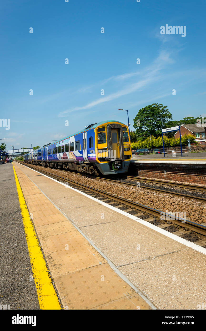 A Northern Rail class 158 passenger train at Brough railway station ...