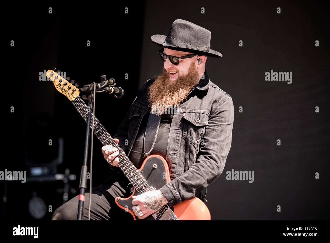 Michael Fry, guitarist of the British rock band Skindred, performing ...