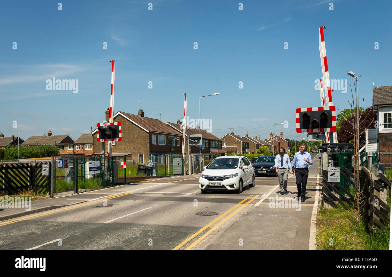Cars on a level crossing hi-res stock photography and images - Alamy