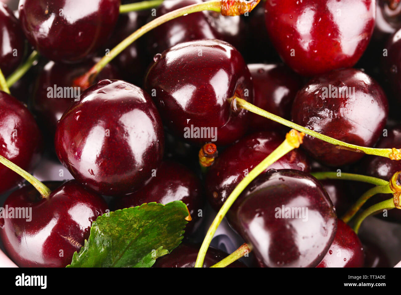 Sweet cherries background Stock Photo - Alamy