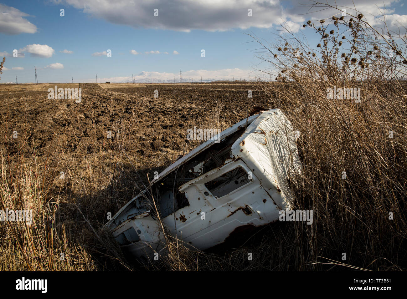 Abandoned Lada chassis in a field of Gyumri. Armenia Stock Photo - Alamy