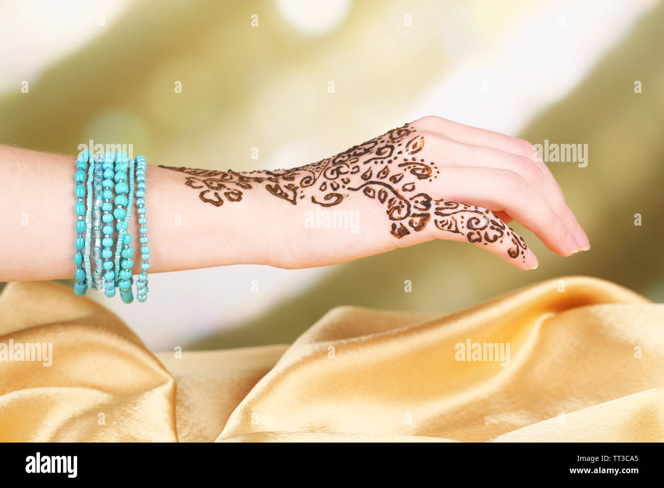 Process of applying Mehndi on female hand, close up Stock Photo - Alamy