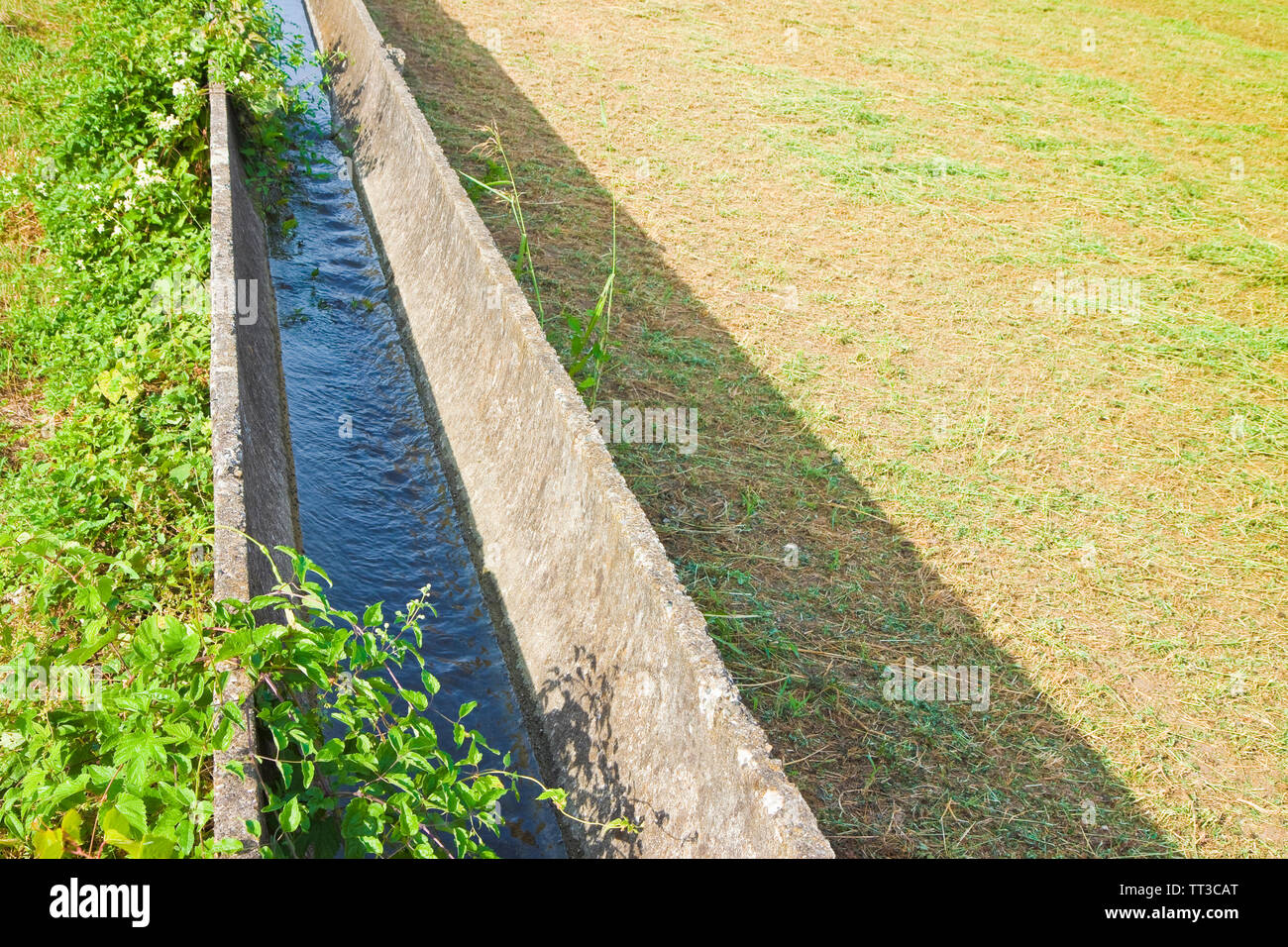 Old italian irrigation channel with old precast concrete elements Stock ...