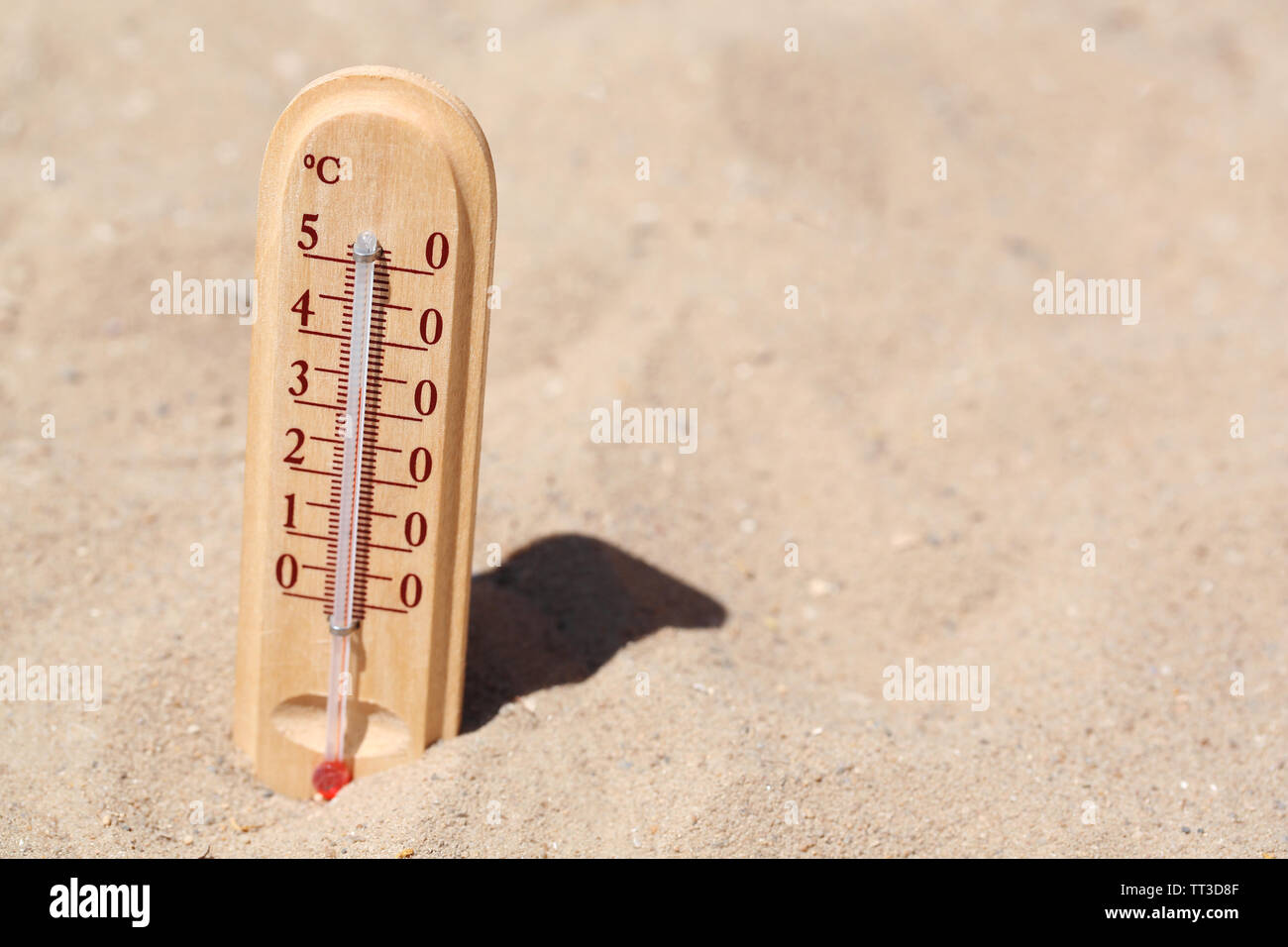 Thermometer in sand close-up Stock Photo - Alamy