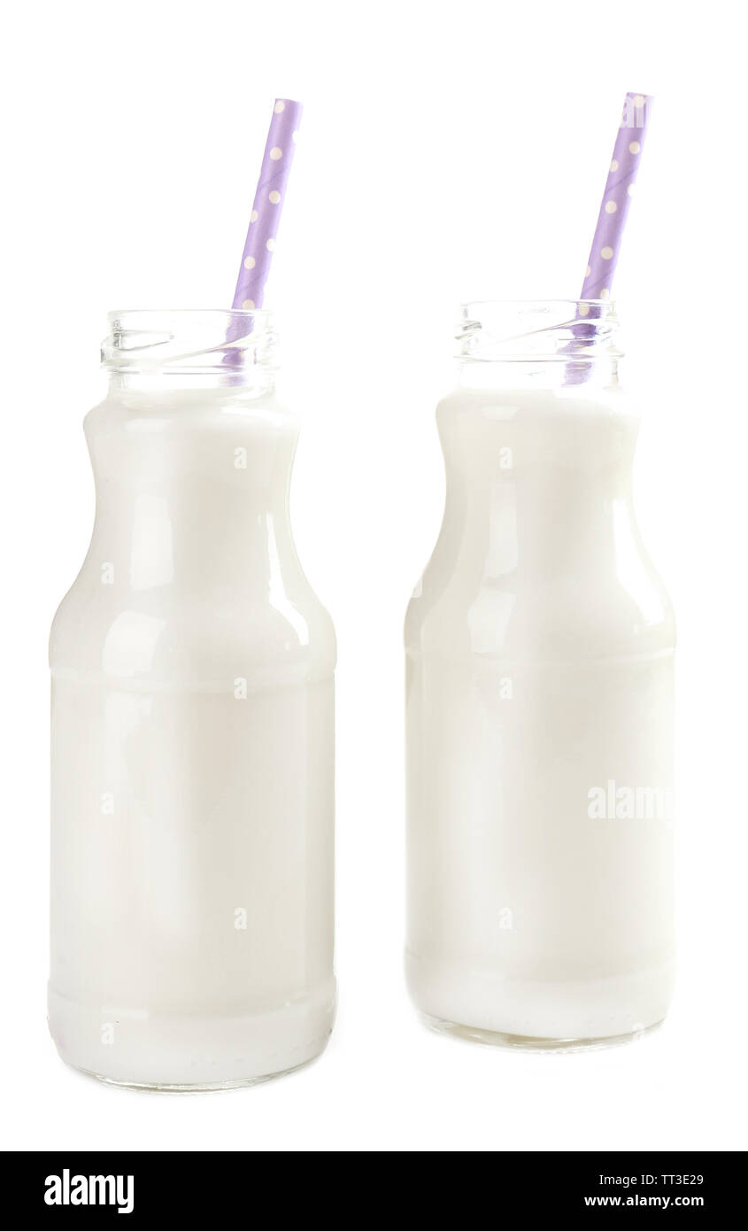 Bottles of milk isolated on white Stock Photo - Alamy