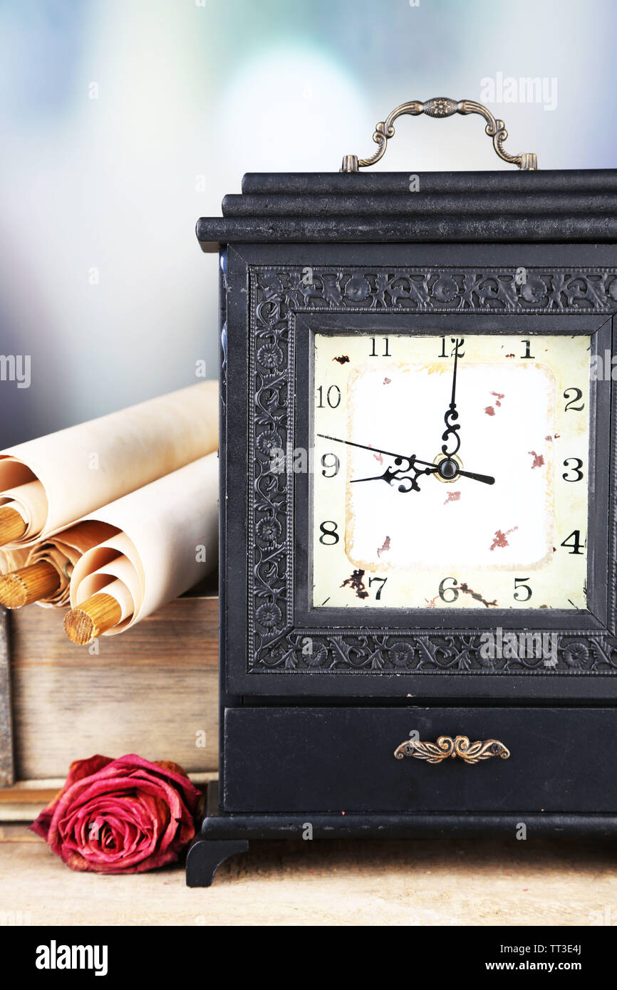 Old retro clock on abstract background Stock Photo - Alamy