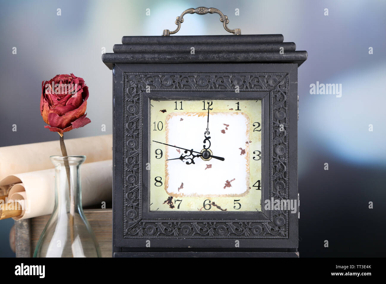 Still life with old retro clock Stock Photo - Alamy