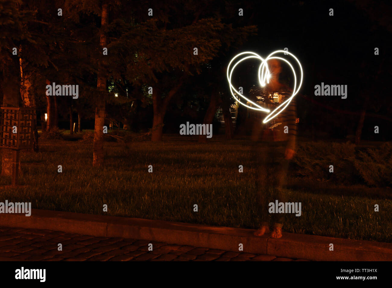 Heart drawn by light at night Stock Photo - Alamy