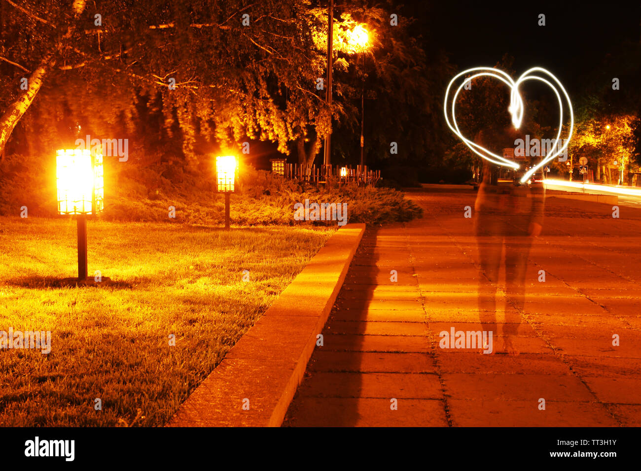 Heart drawn by light at night Stock Photo - Alamy