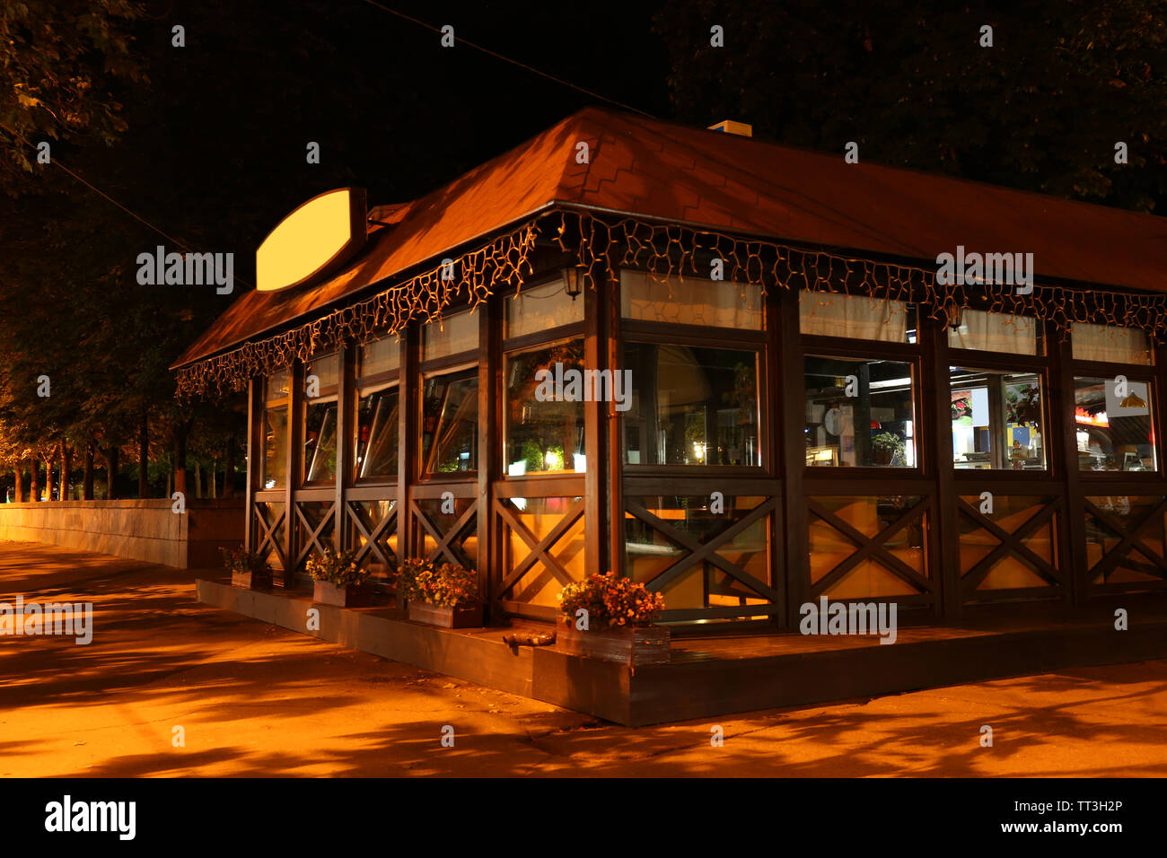 Night cafe in walking street Stock Photo - Alamy
