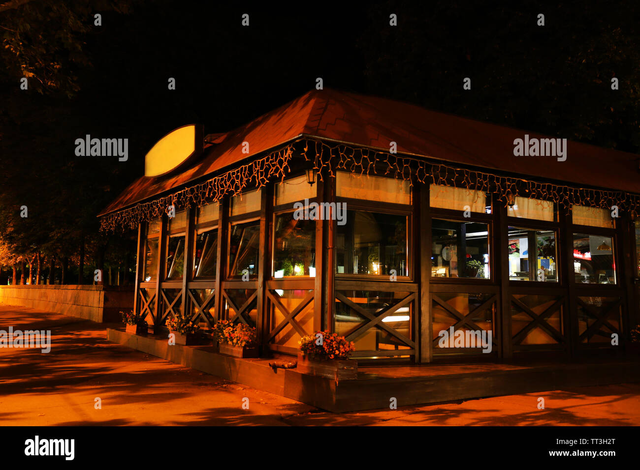 Night cafe in walking street Stock Photo - Alamy