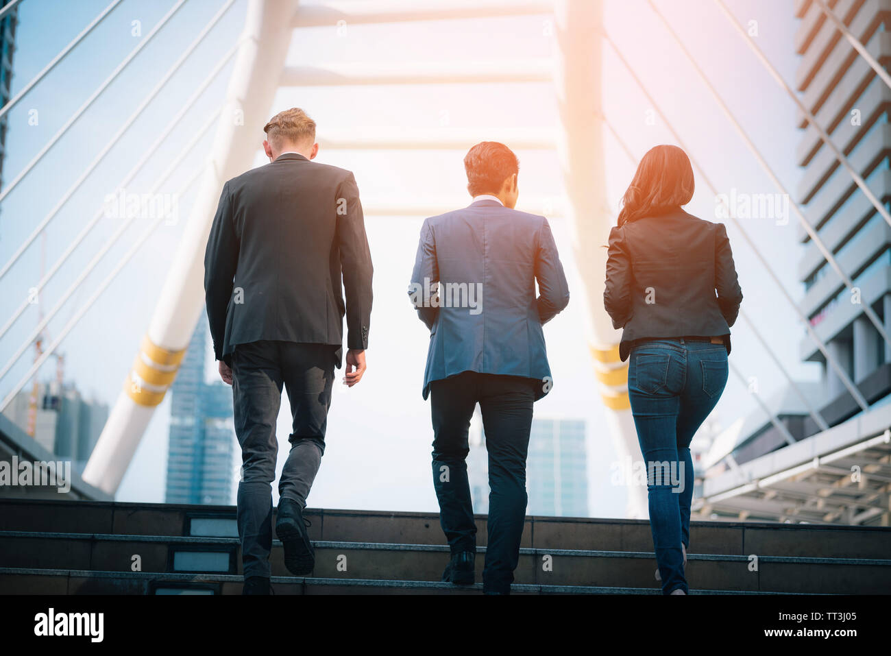 Business people climbing stairs hi-res stock photography and images - Alamy