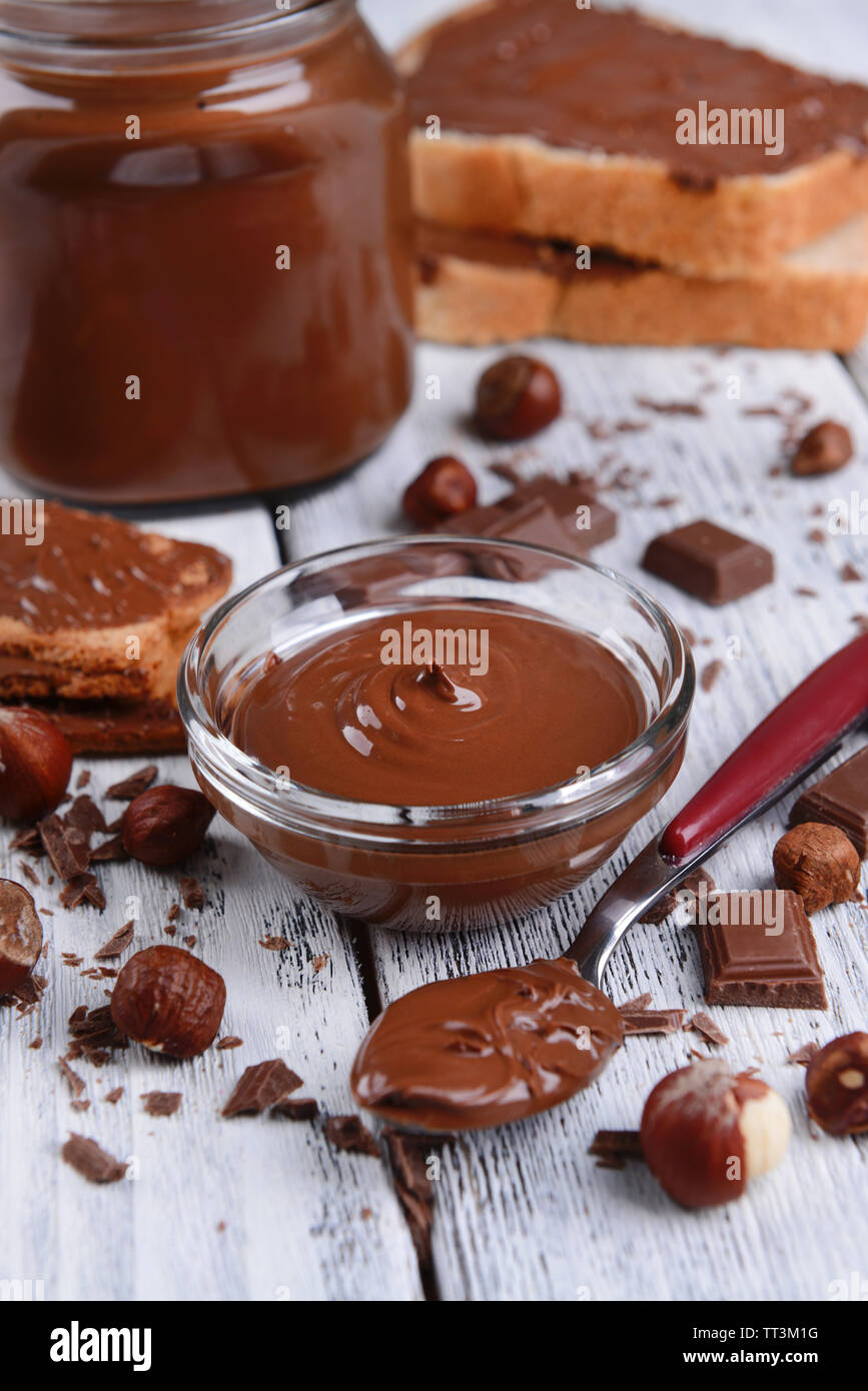 Sweet chocolate cream in bowl on table close-up Stock Photo - Alamy