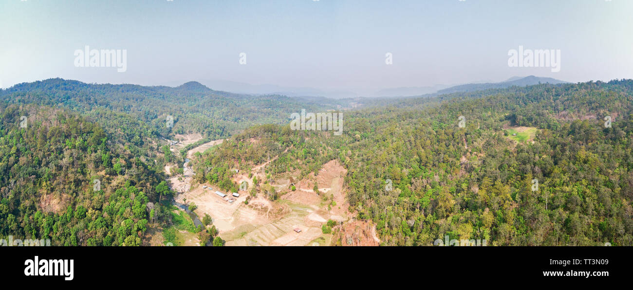 Aerial view of dry tropical jungle, hills and valley, Thailand Stock ...
