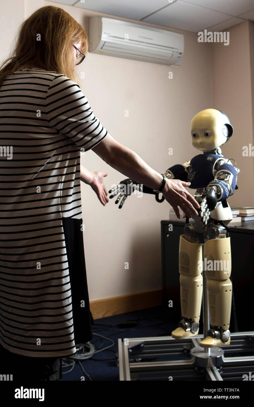 Professor Kerstin Dautenhahn interacting with intelligent robots ...