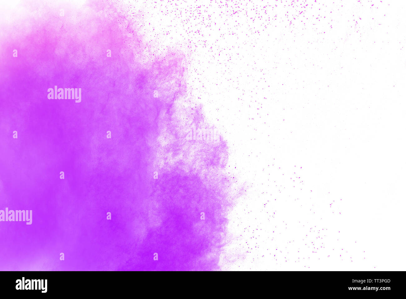 Purple color powder explosion cloud on white background.Closeup of ...