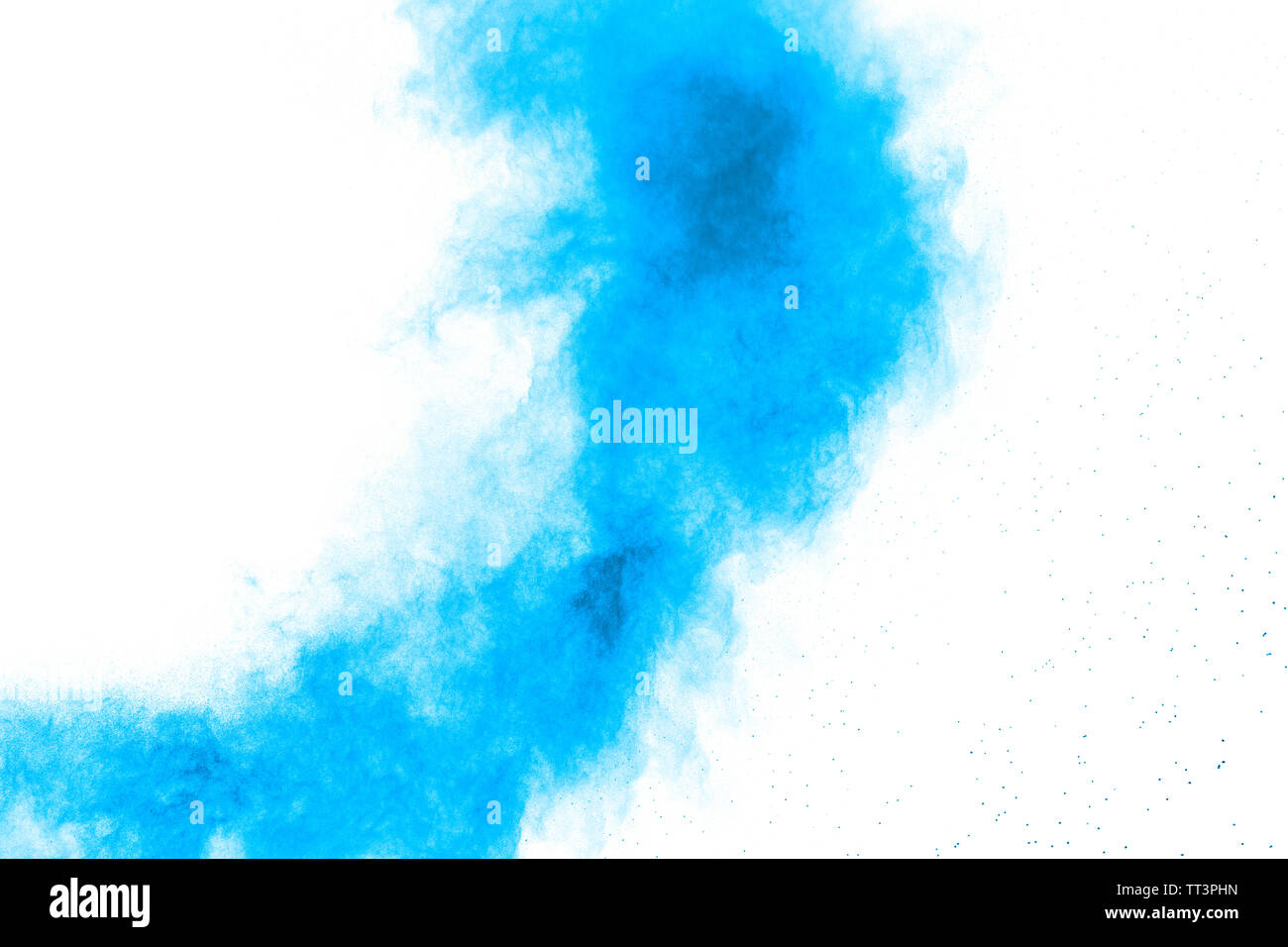 Abstract blue dust explosion on white background.Freeze motion of blue ...