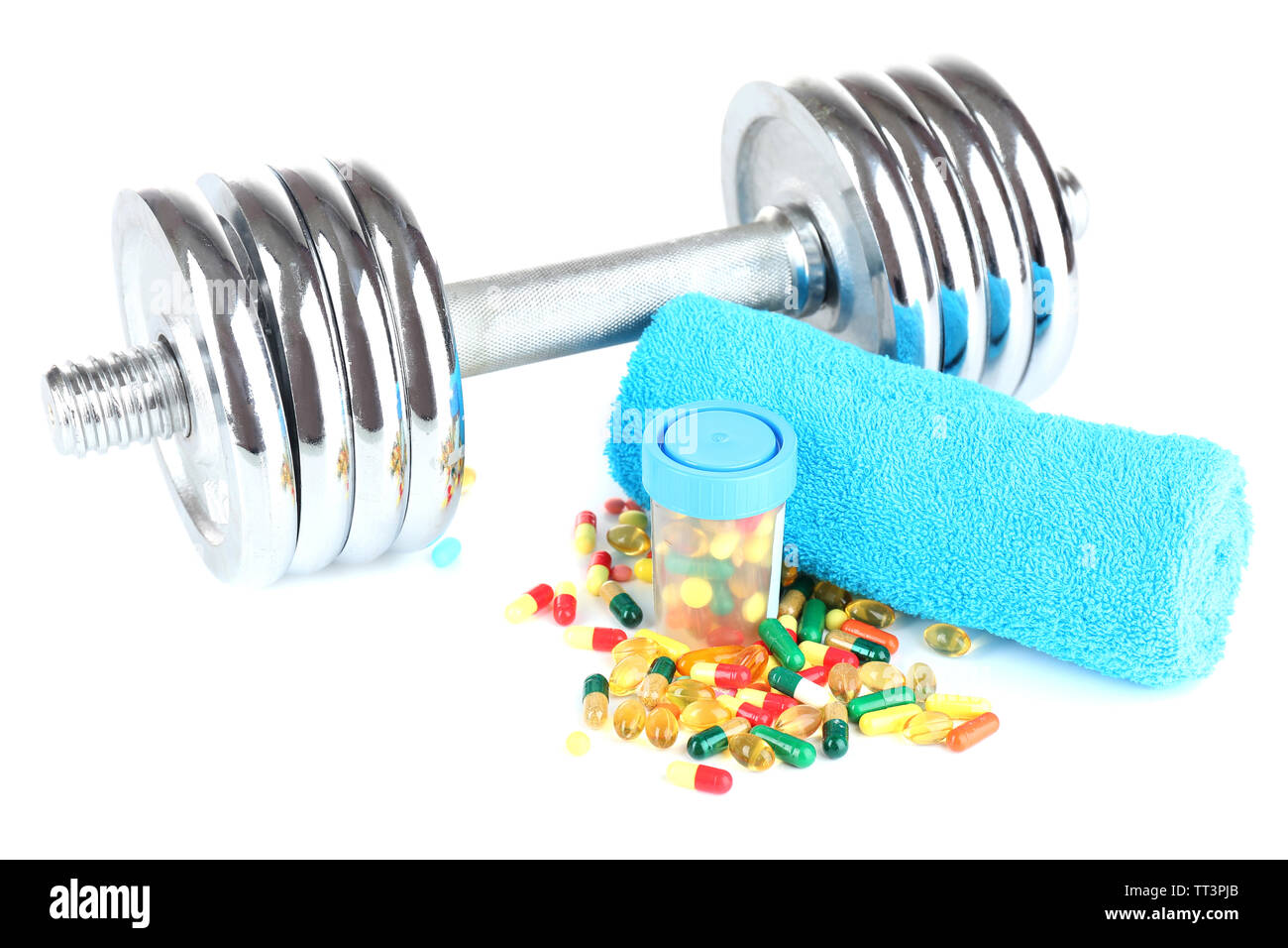 Dumbbell and colorful pills, tablets, isolated on white Stock Photo - Alamy