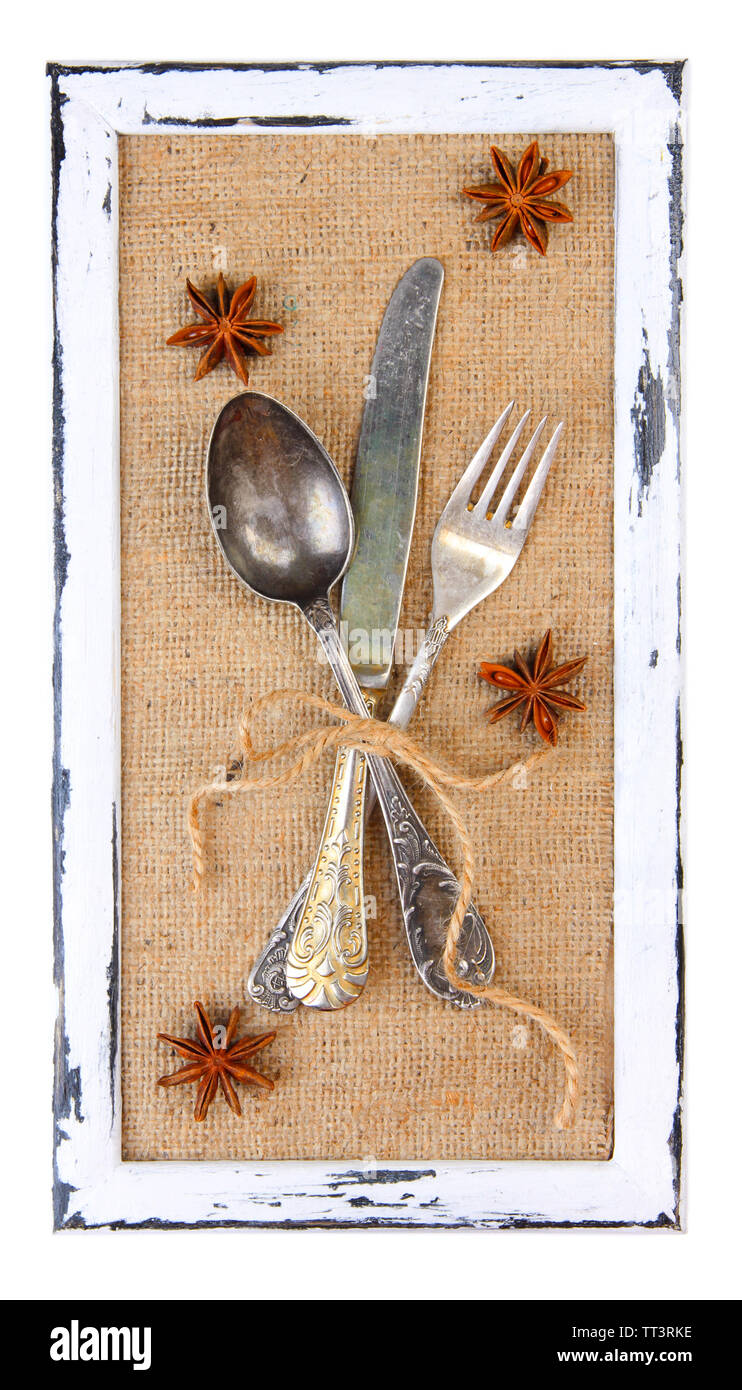 Wooden frame and vintage cutlery and spices isolated on white Stock ...