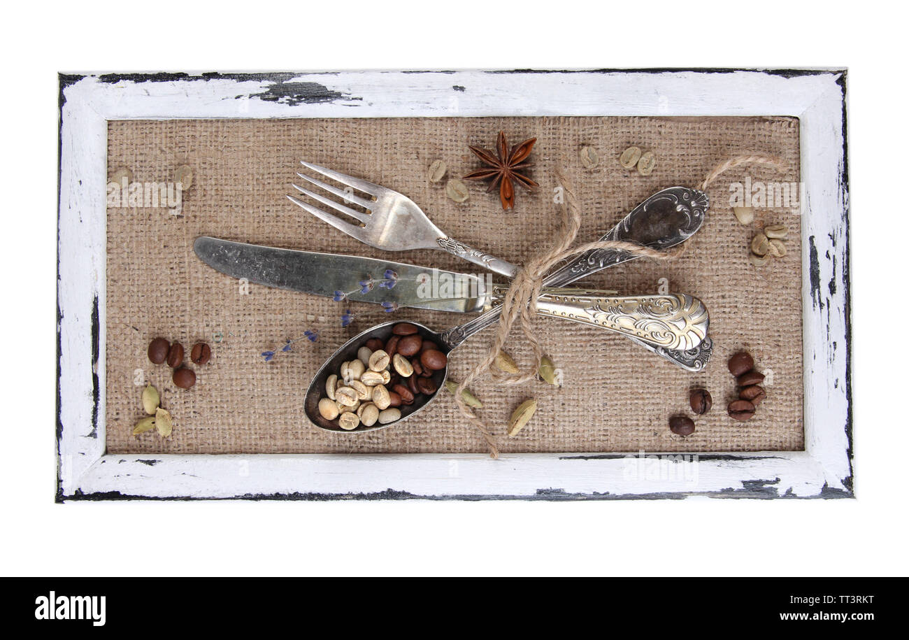 Wooden frame and vintage cutlery and spices isolated on white Stock ...