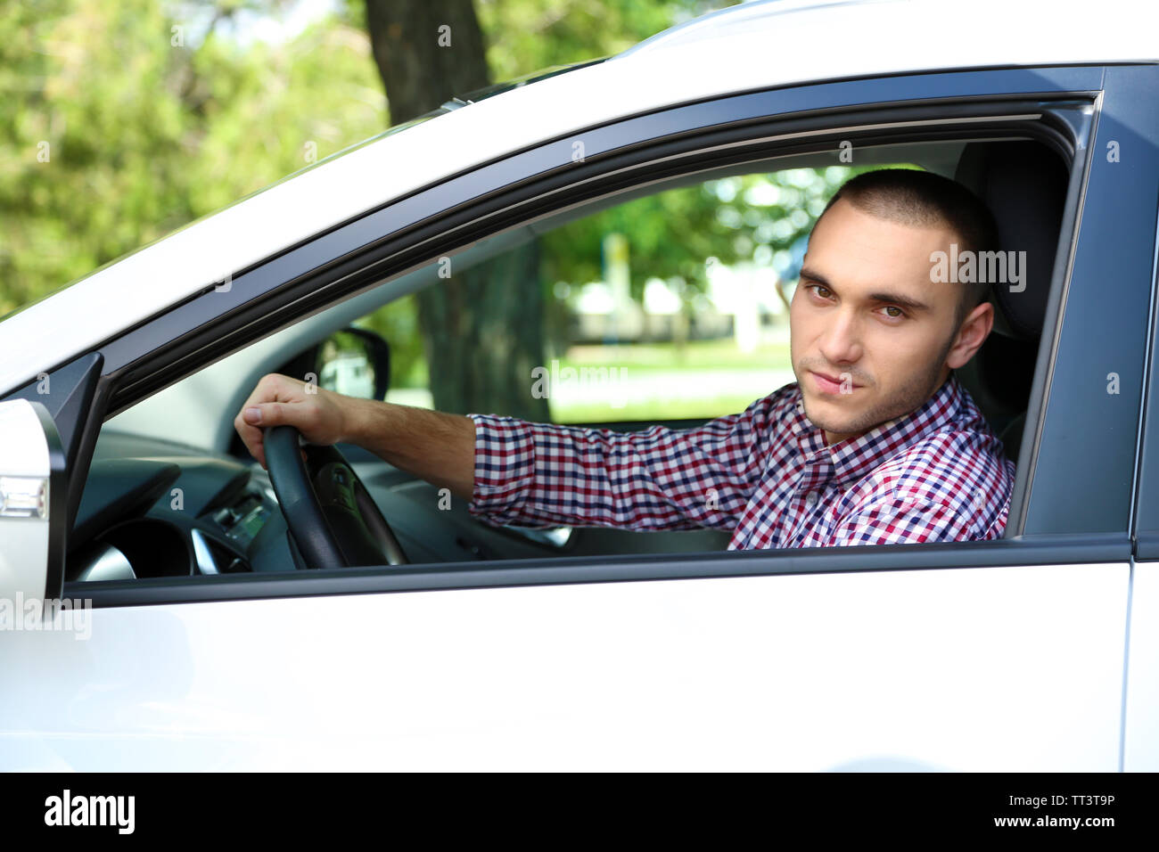Man driving car Stock Photo - Alamy