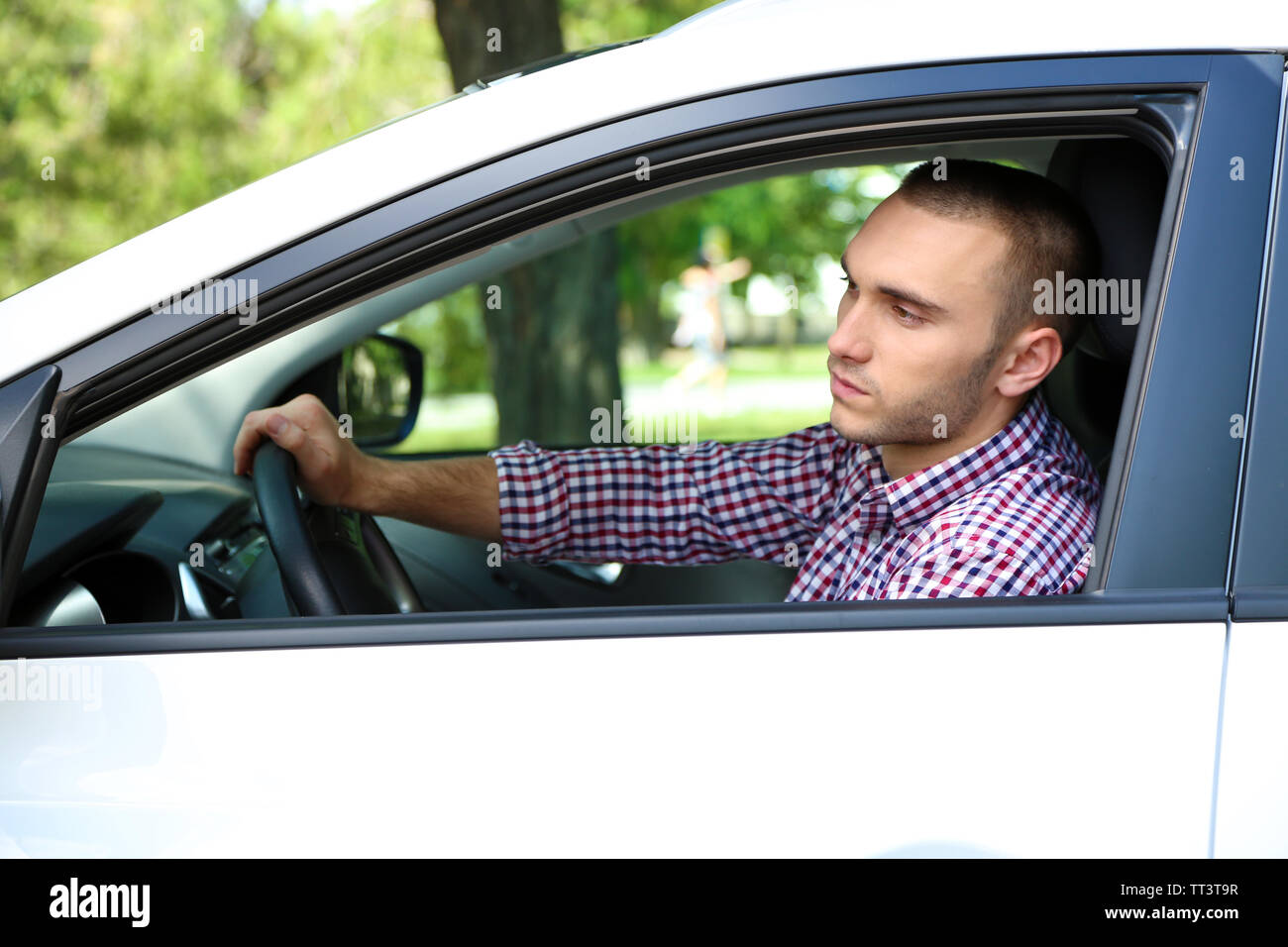 Man driving car Stock Photo - Alamy
