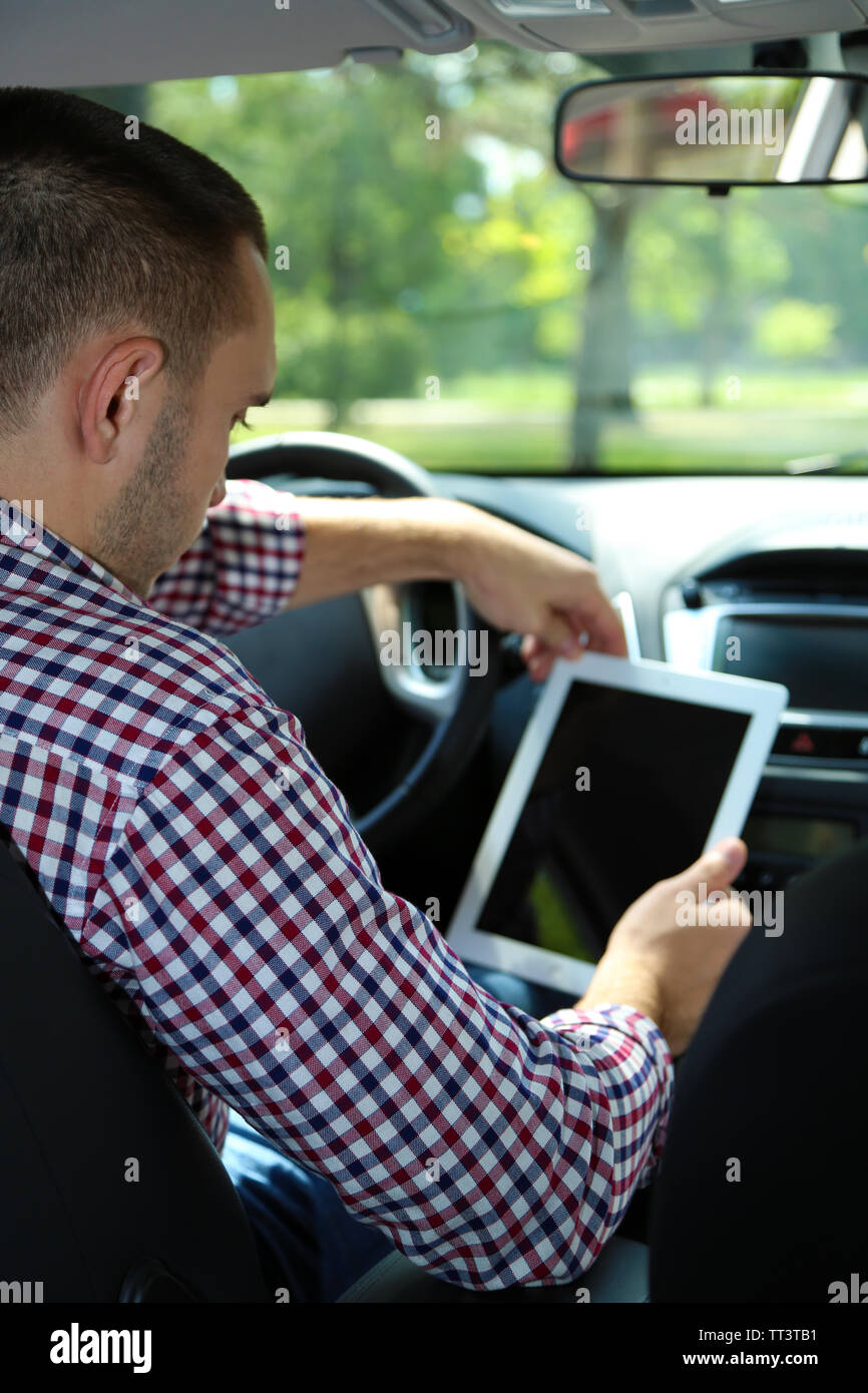 Driving car and path finding to navigator Stock Photo - Alamy