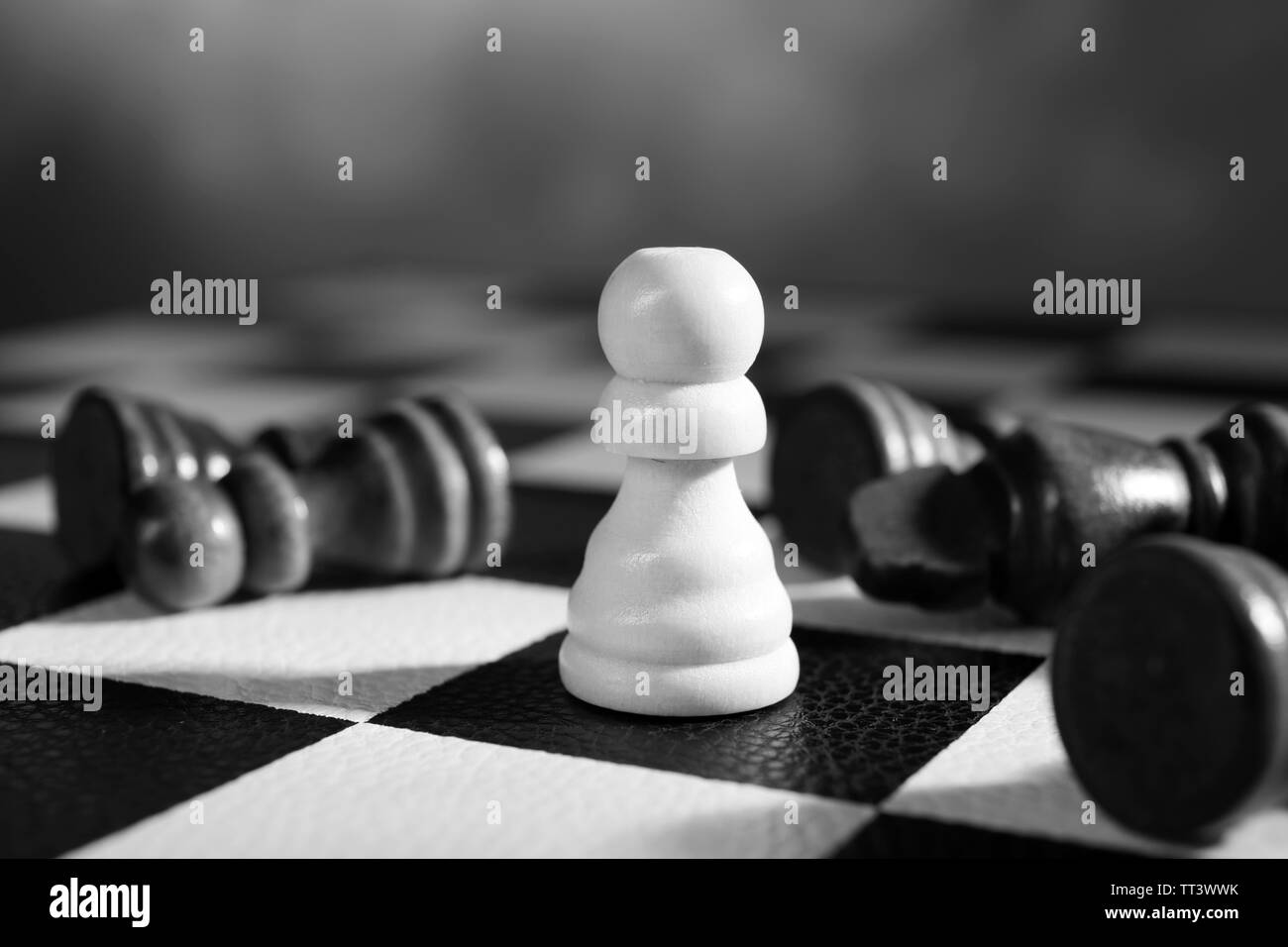 Chess board with chess pieces on grey background Stock Photo - Alamy