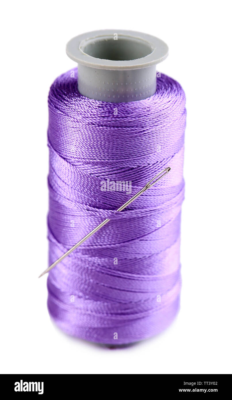 Needle and spool of thread isolated on white Stock Photo - Alamy
