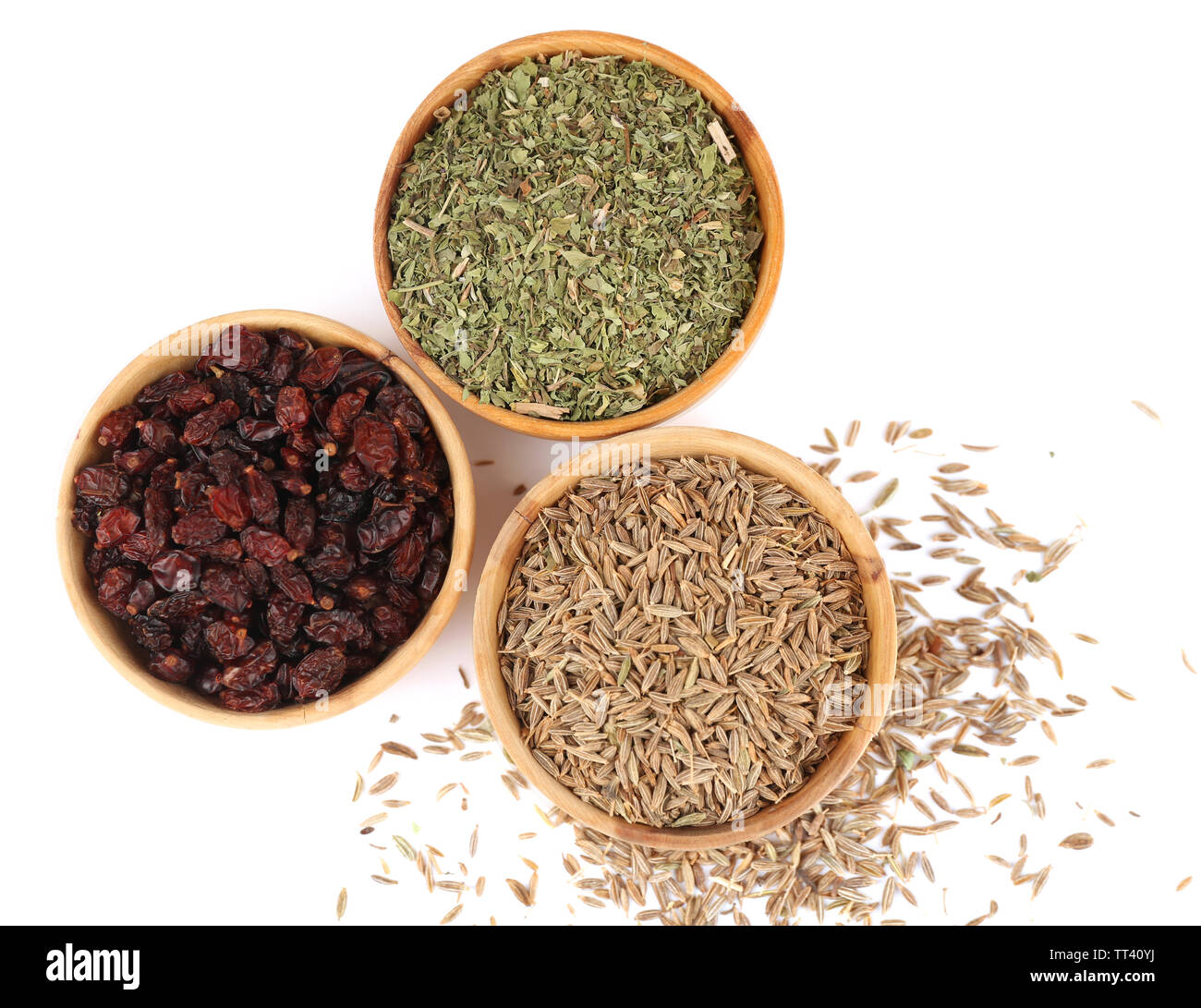 Round wooden bowls full of seasoning on white background isolated Stock ...