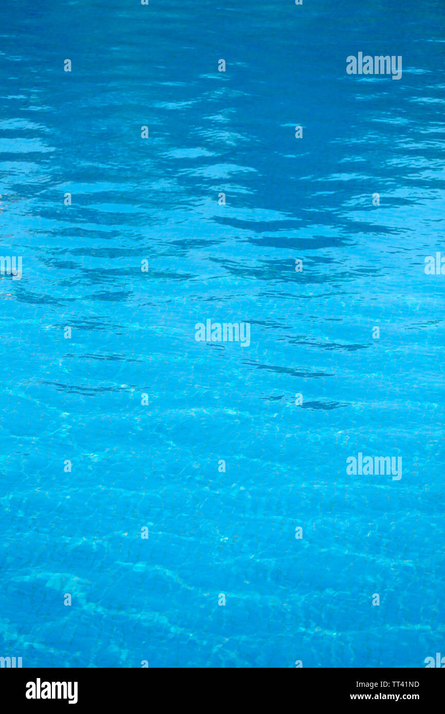 Blue water in swimming pool Stock Photo - Alamy