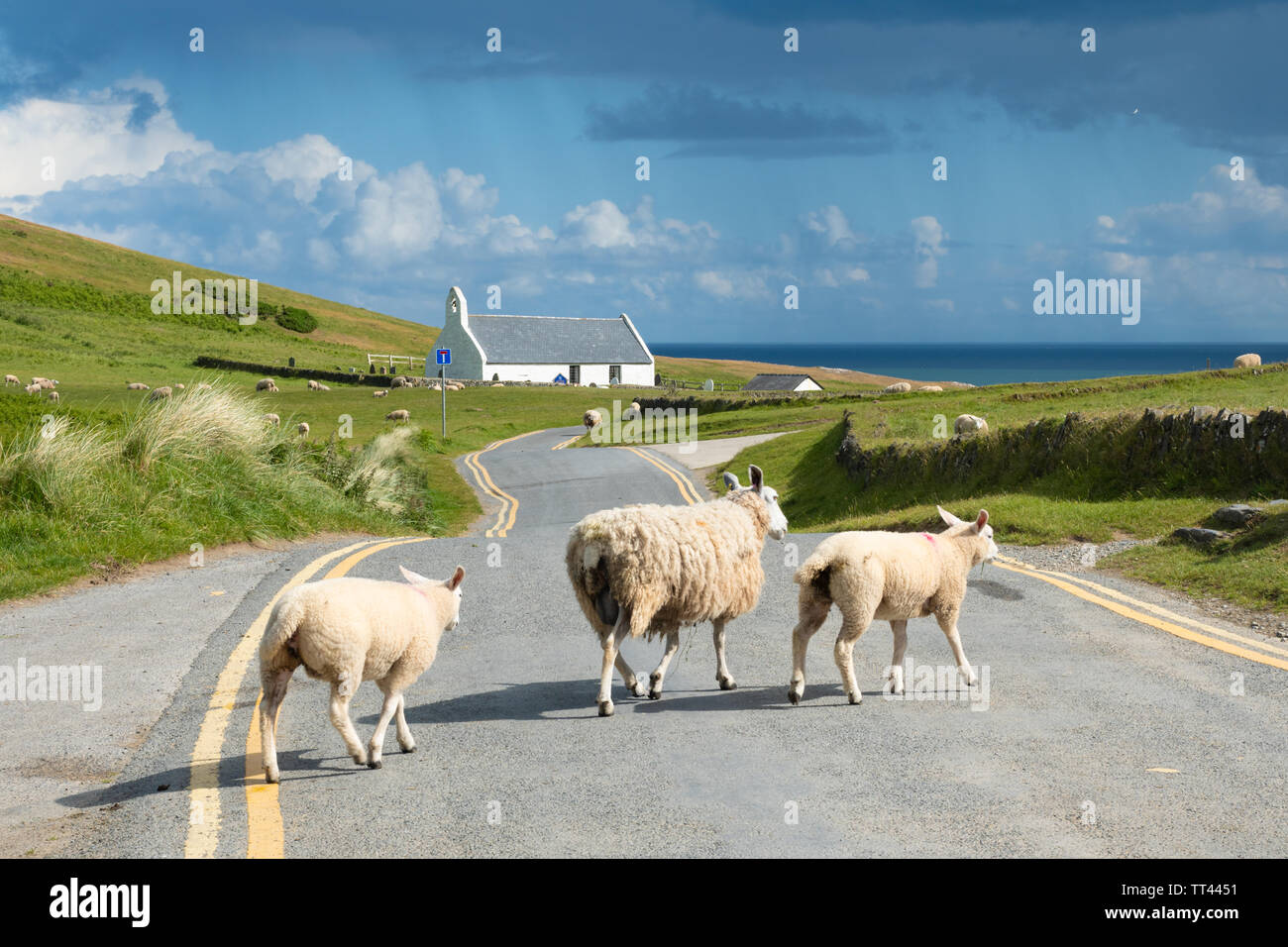 Mwnt Bay with The Church of the Holy Cross (Welsh: Eglwys y Grog), an ...