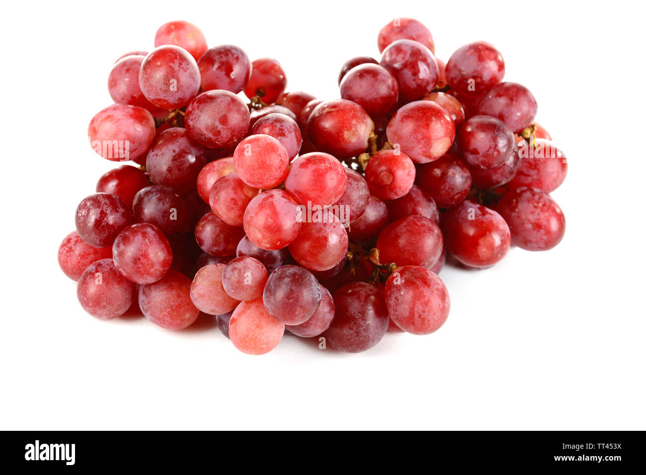 Sweet red grapes isolated on white Stock Photo - Alamy