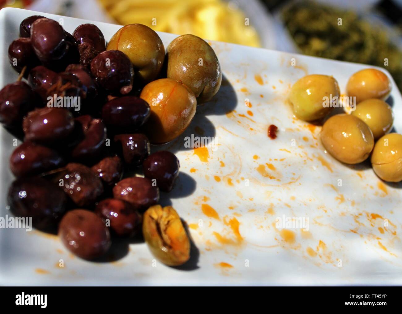 Tasty and small black olives split in the mediterranean style Stock ...