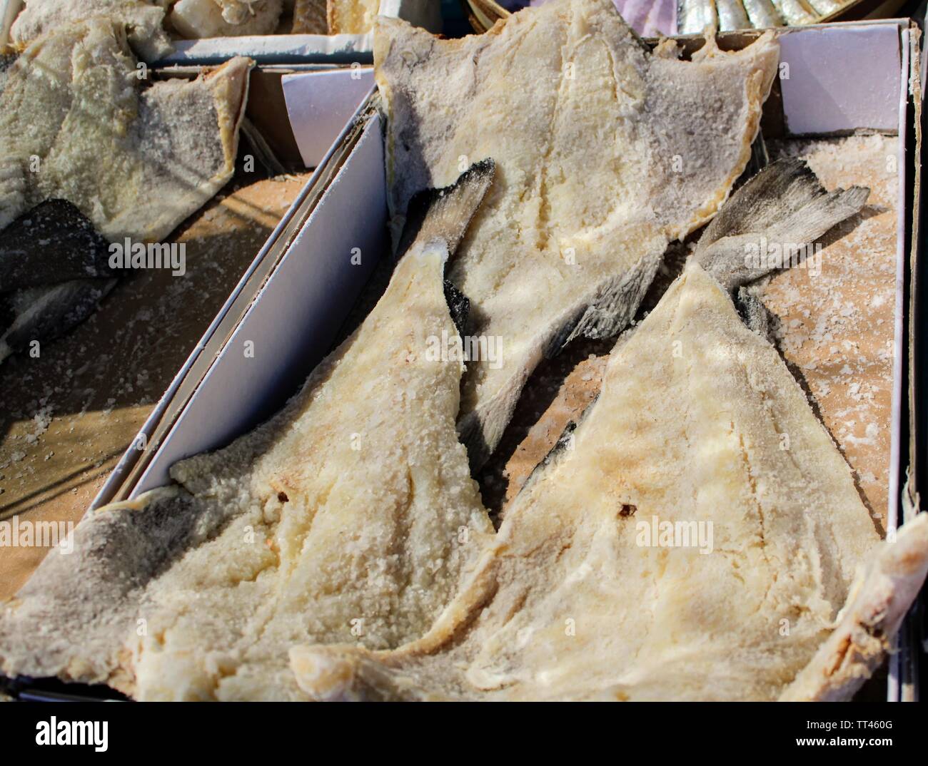 Cardboard boxes with large filets of dried and salted cod Stock Photo ...