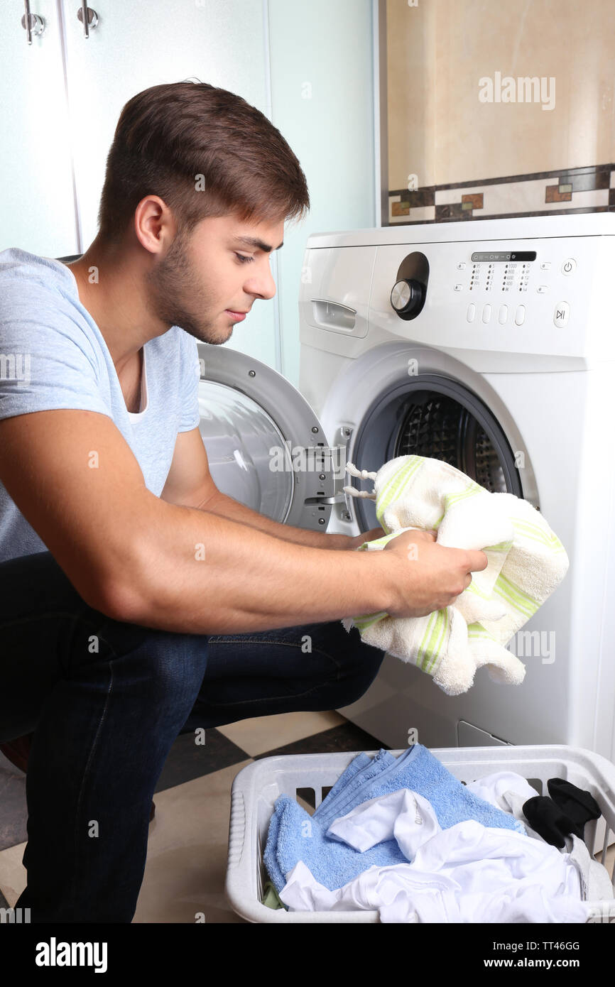 Portrait man washing machine hi-res stock photography and images - Alamy