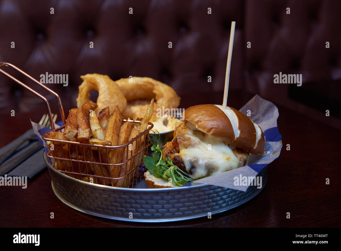 Italian cheeseburger and fries Stock Photo - Alamy