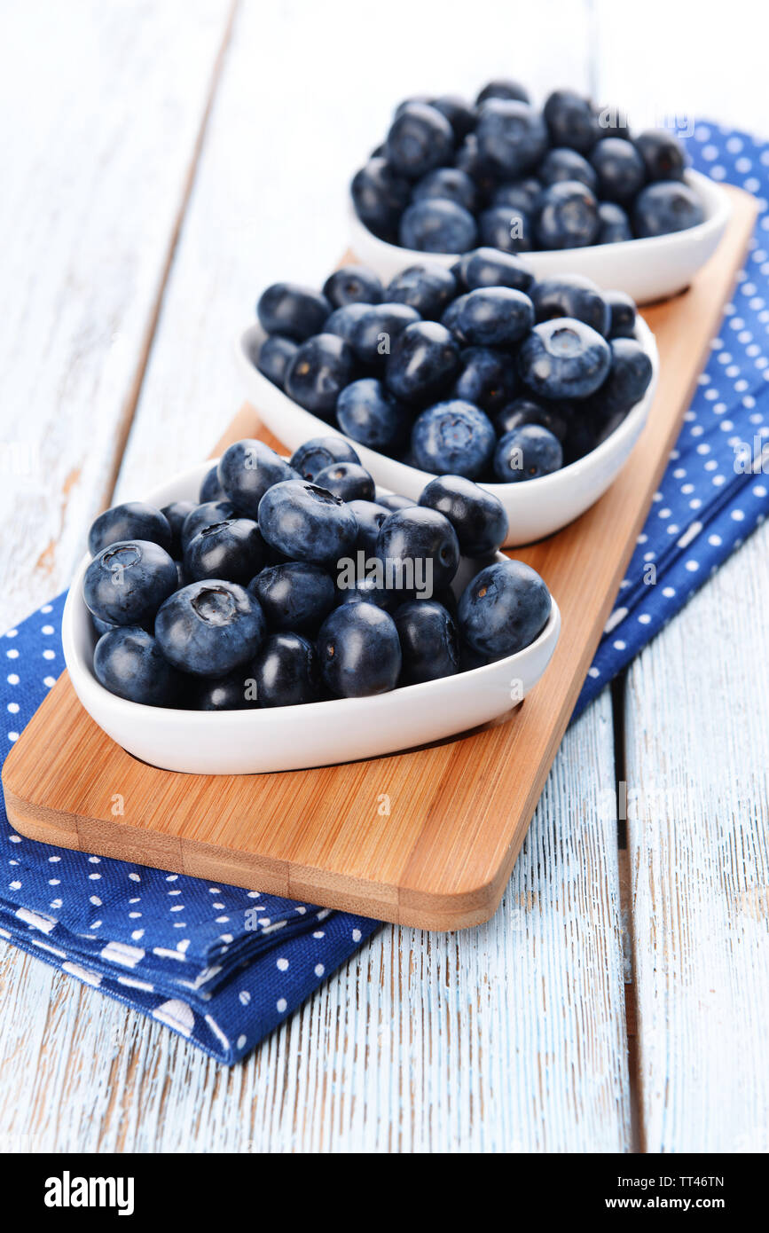 Delicious blueberries on table close-up Stock Photo - Alamy