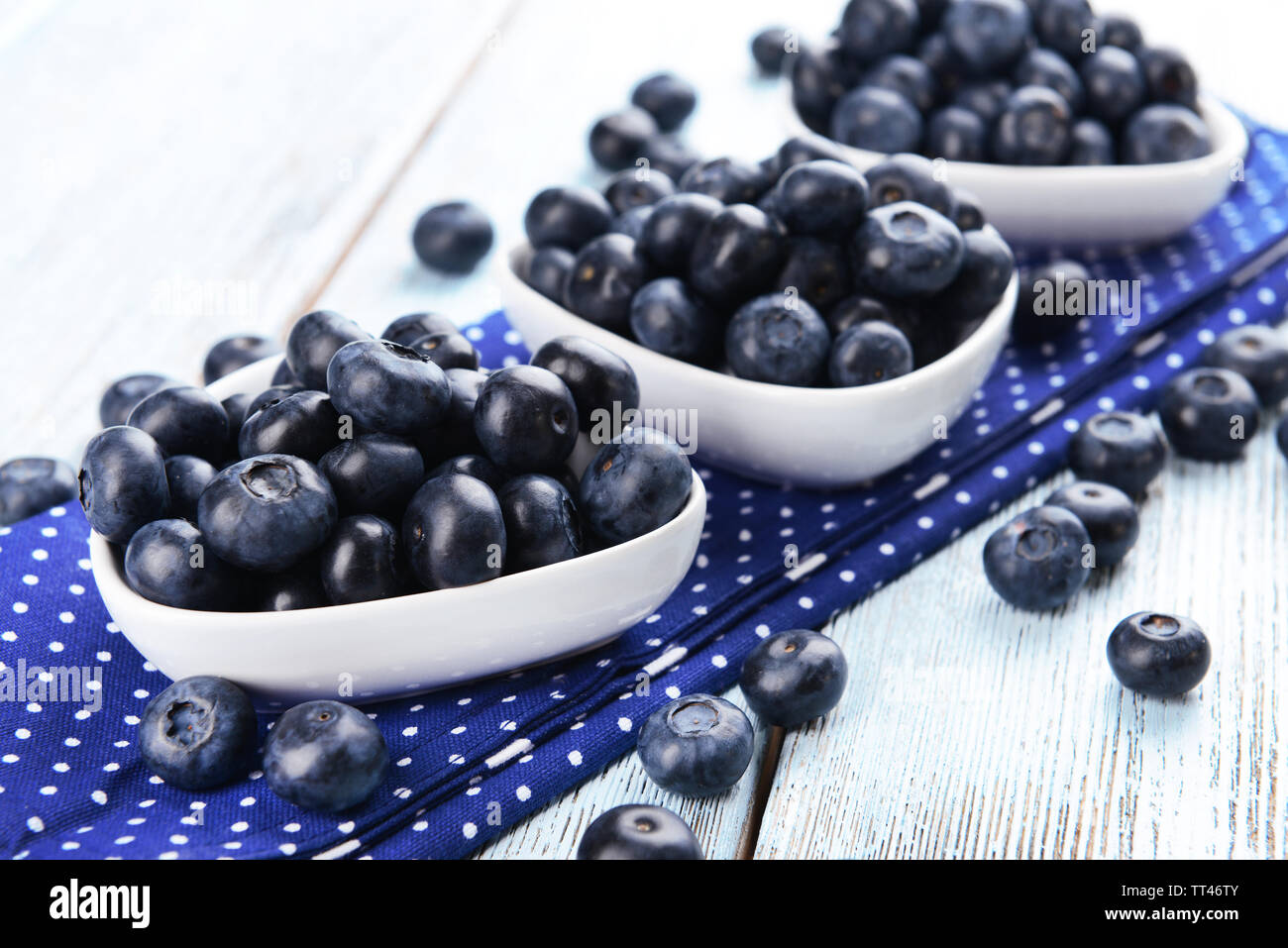 Delicious blueberries on table close-up Stock Photo - Alamy